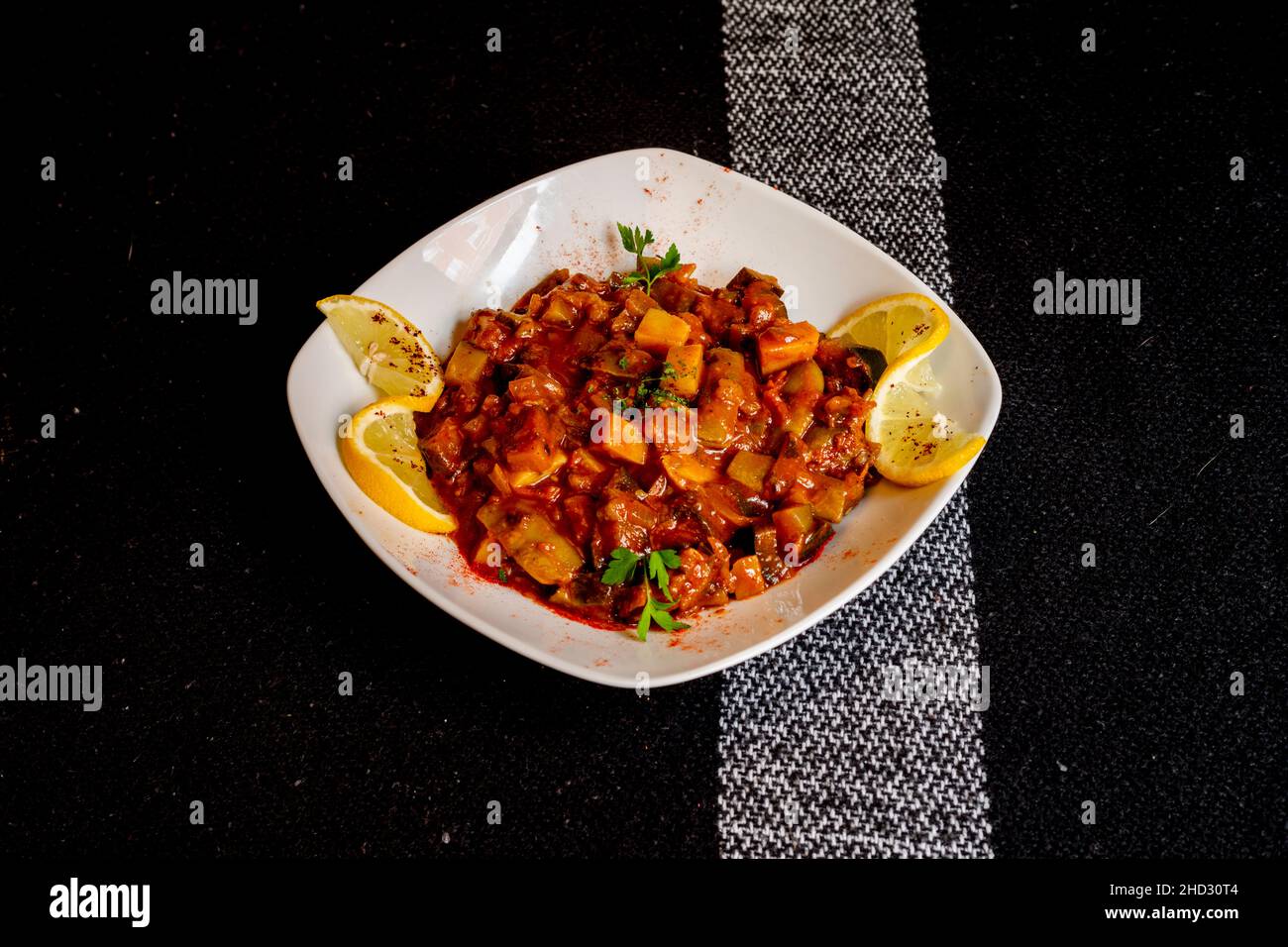 The tajin or also spelled tayin, due to its pronunciation, is a ...