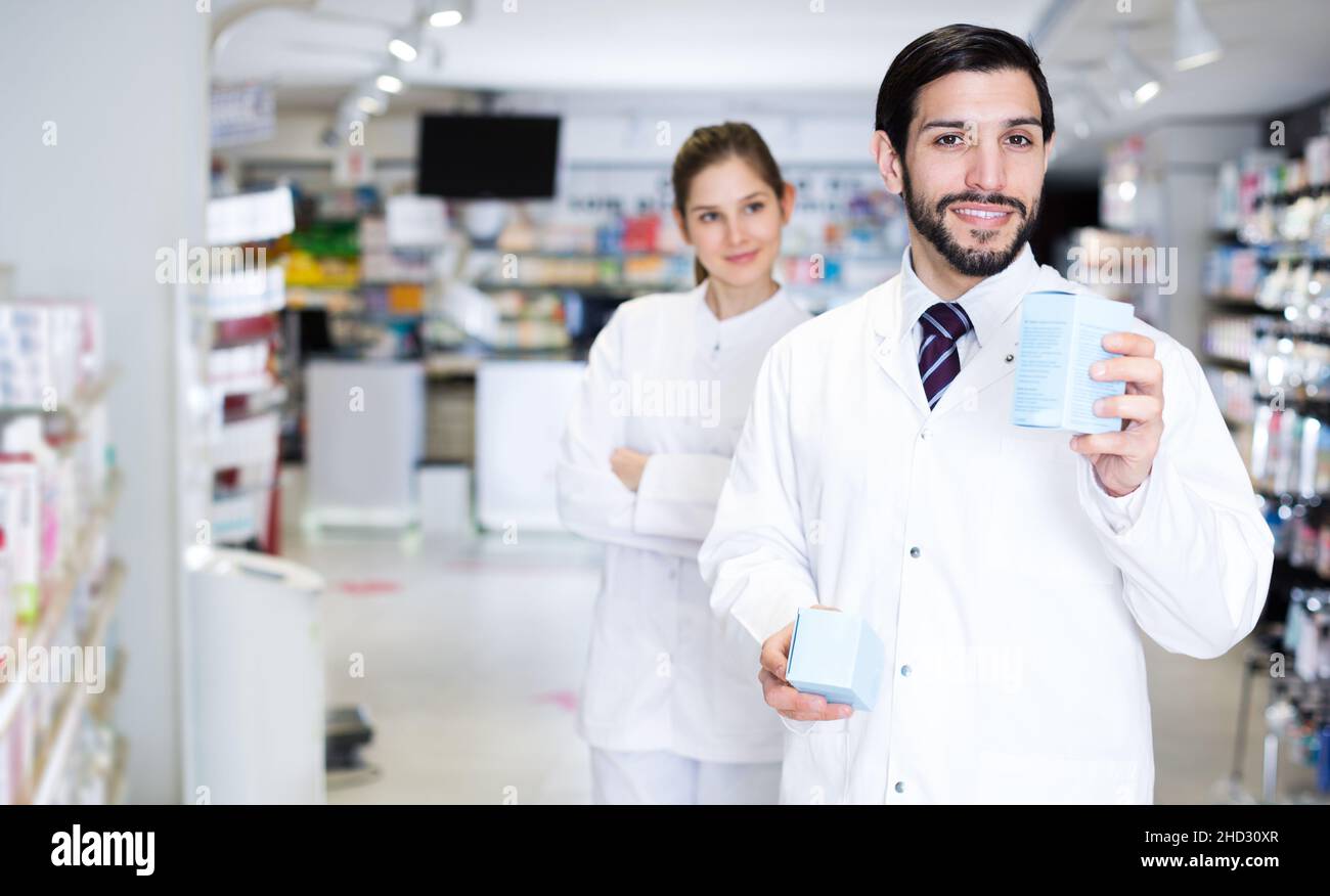 Happy pharmacist work place hi-res stock photography and images - Alamy