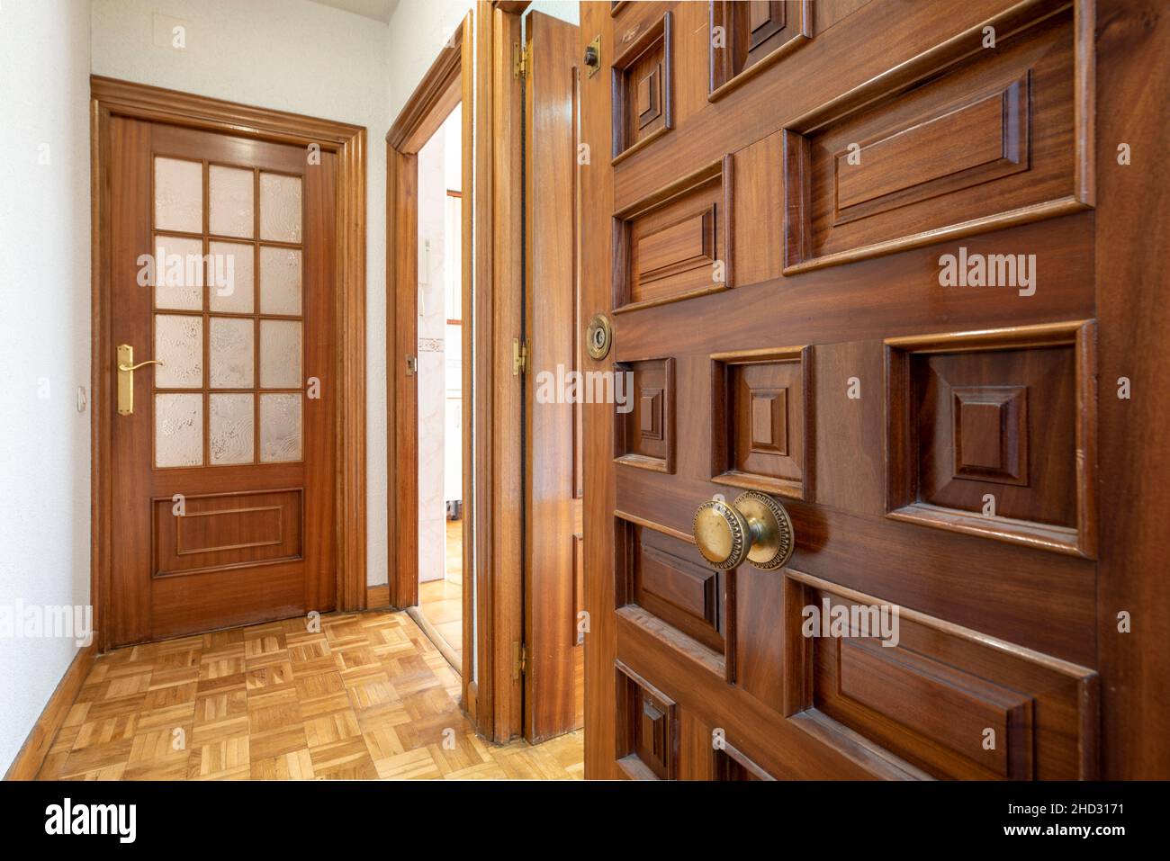 Entrance door made of mahogany wood and panels combined with oak ...