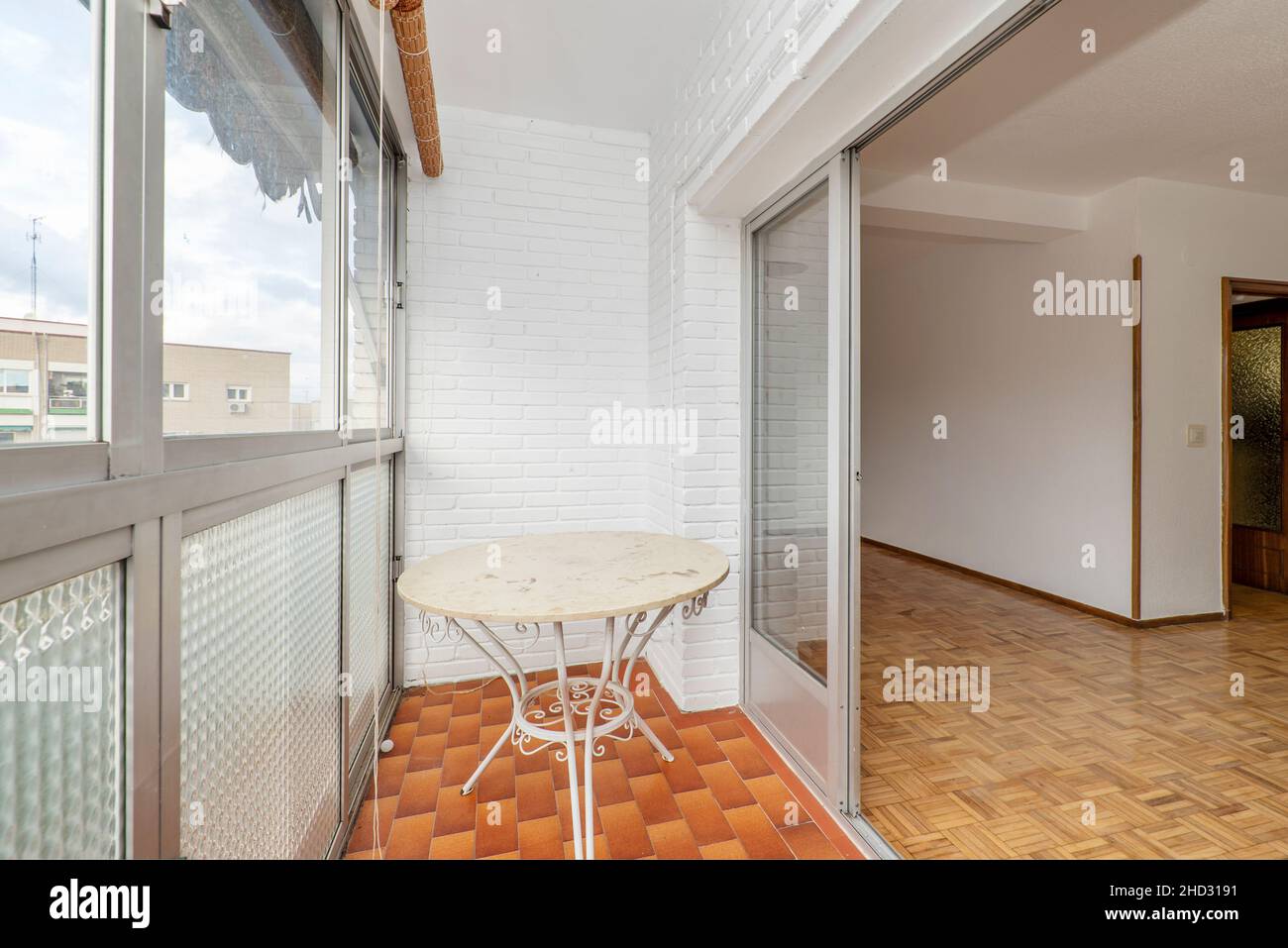 Glazed terrace in residential home with central heating Stock Photo - Alamy