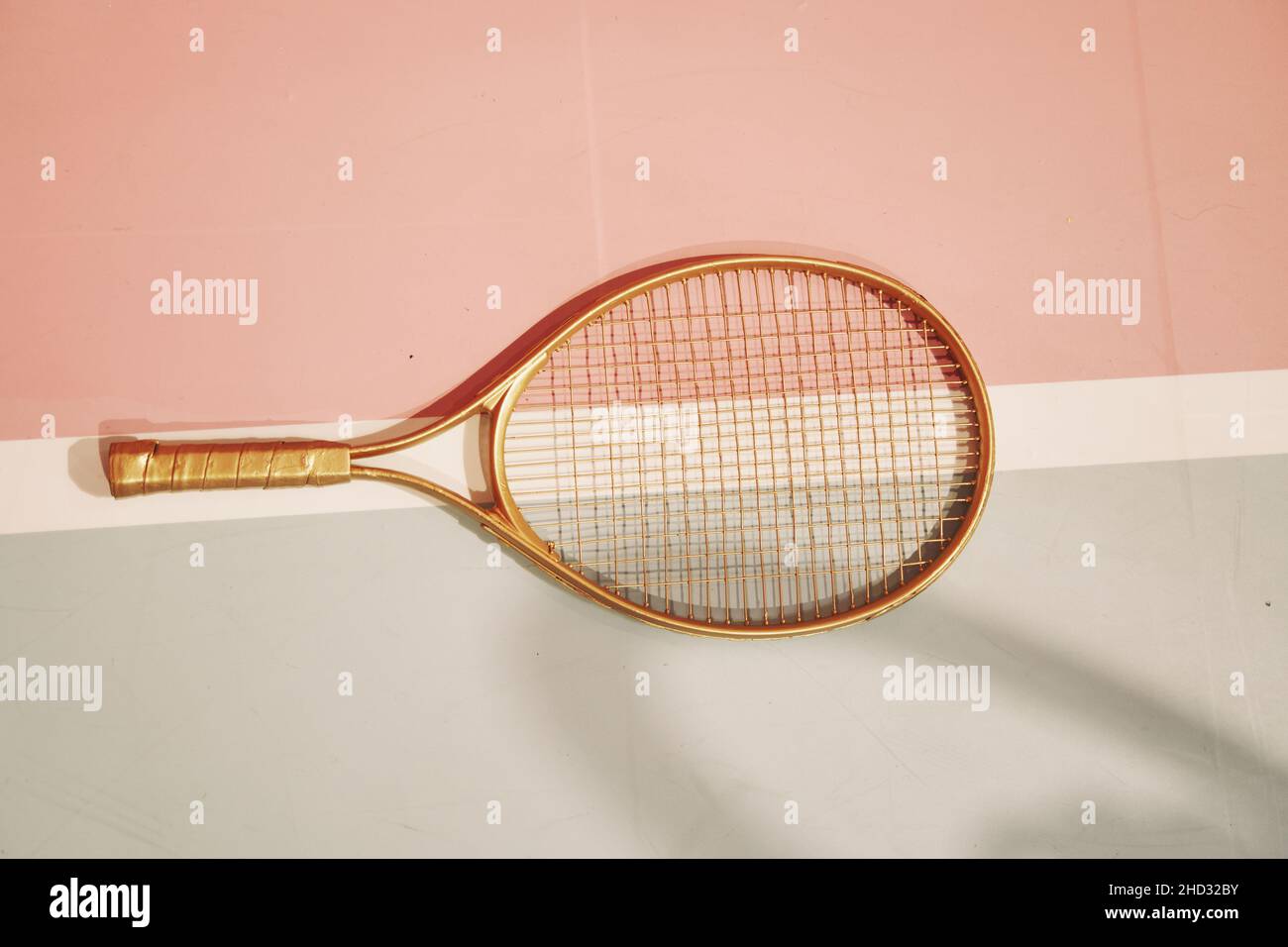 tennis racket on the course in pink blue and gold colours Stock Photo ...