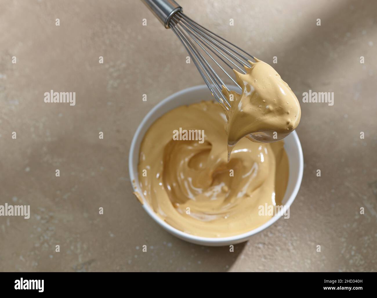 bowl of whipped instant coffee with sugar and water for making Dalgona ...