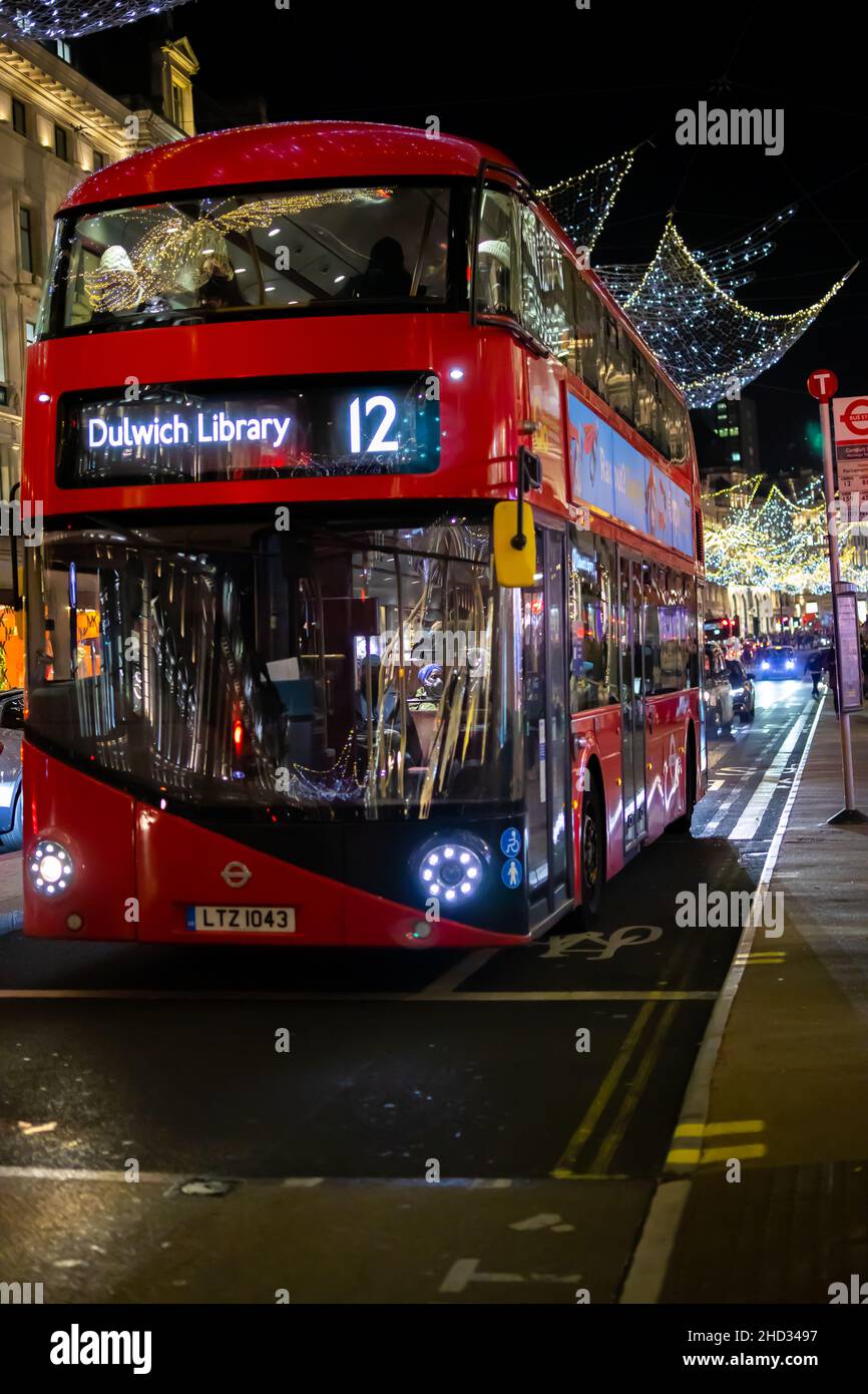 Red London Bus at Night in Regent Street during December Stock Photo ...