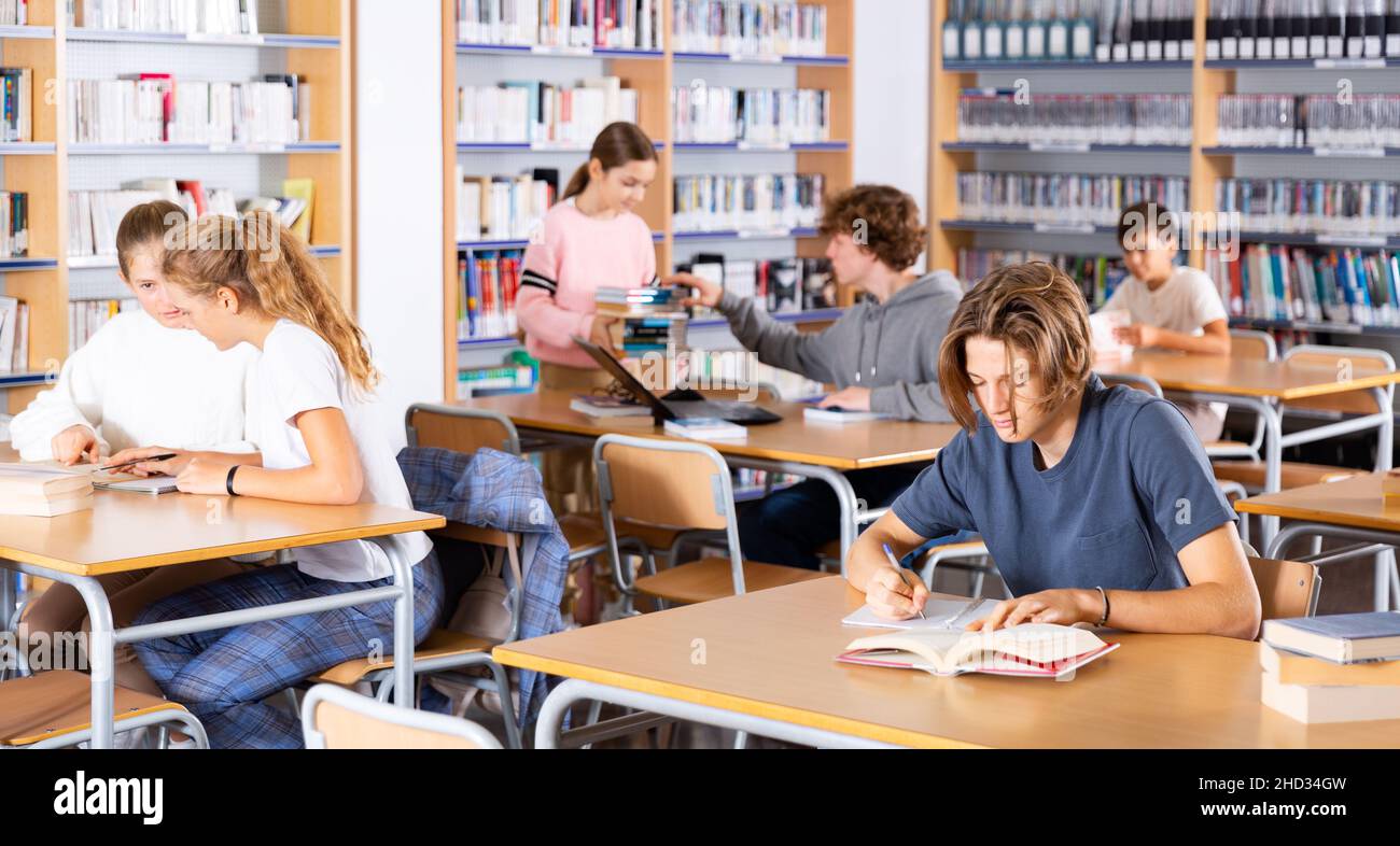 Fifteen-year-old schoolboy writes an synopsis Stock Photo - Alamy