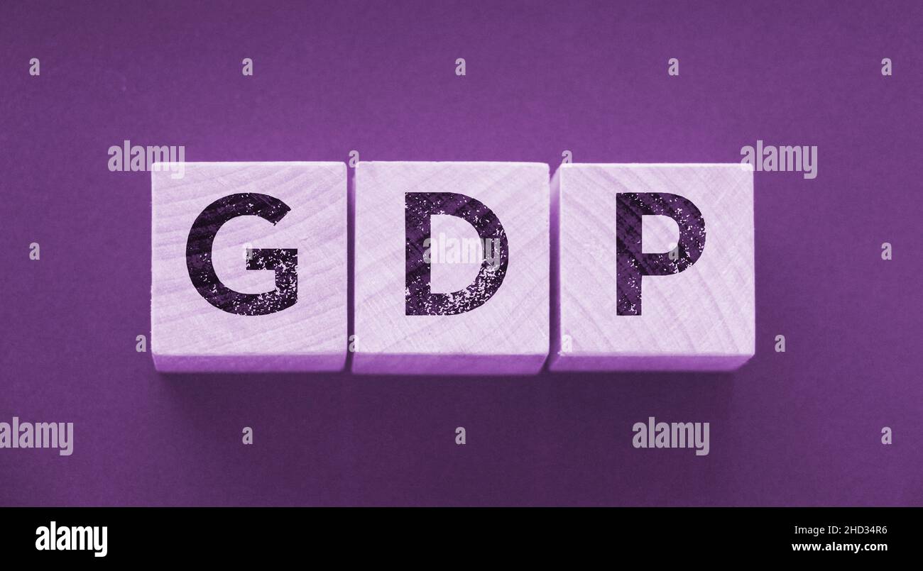 GDP, Gross Domestic Product concept, cube wooden block with alphabet ...