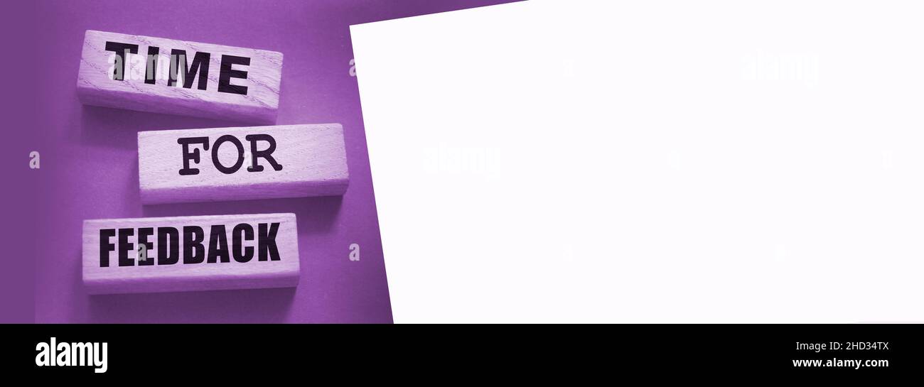 Time fir feedback text on wooden blocks. Product or service evaluation ...