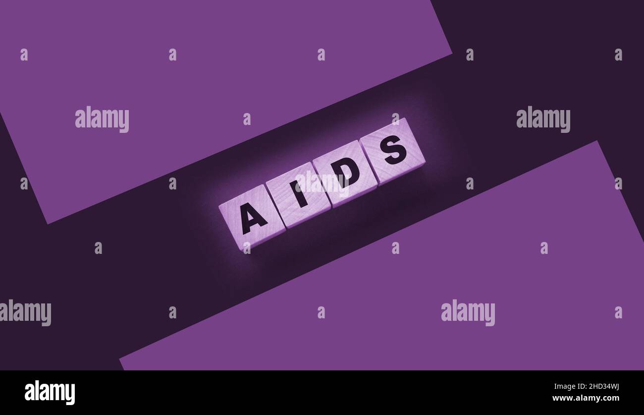 AIDS abbreviation written on wooden cubes. Healthcare concept. STD ...