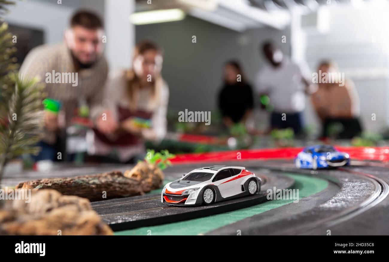 Models of race cars on track Stock Photo - Alamy