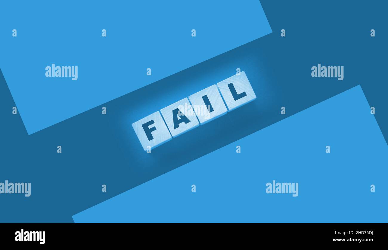 FAIL Word text Written In Wooden Cube blocks on black background ...