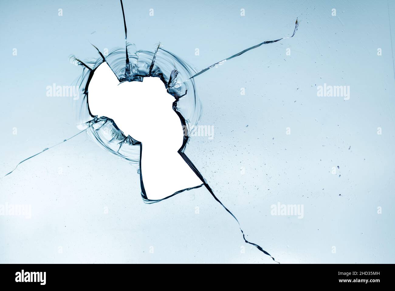 High quality broken glass texture. Hole in dirty glass. On a light ...