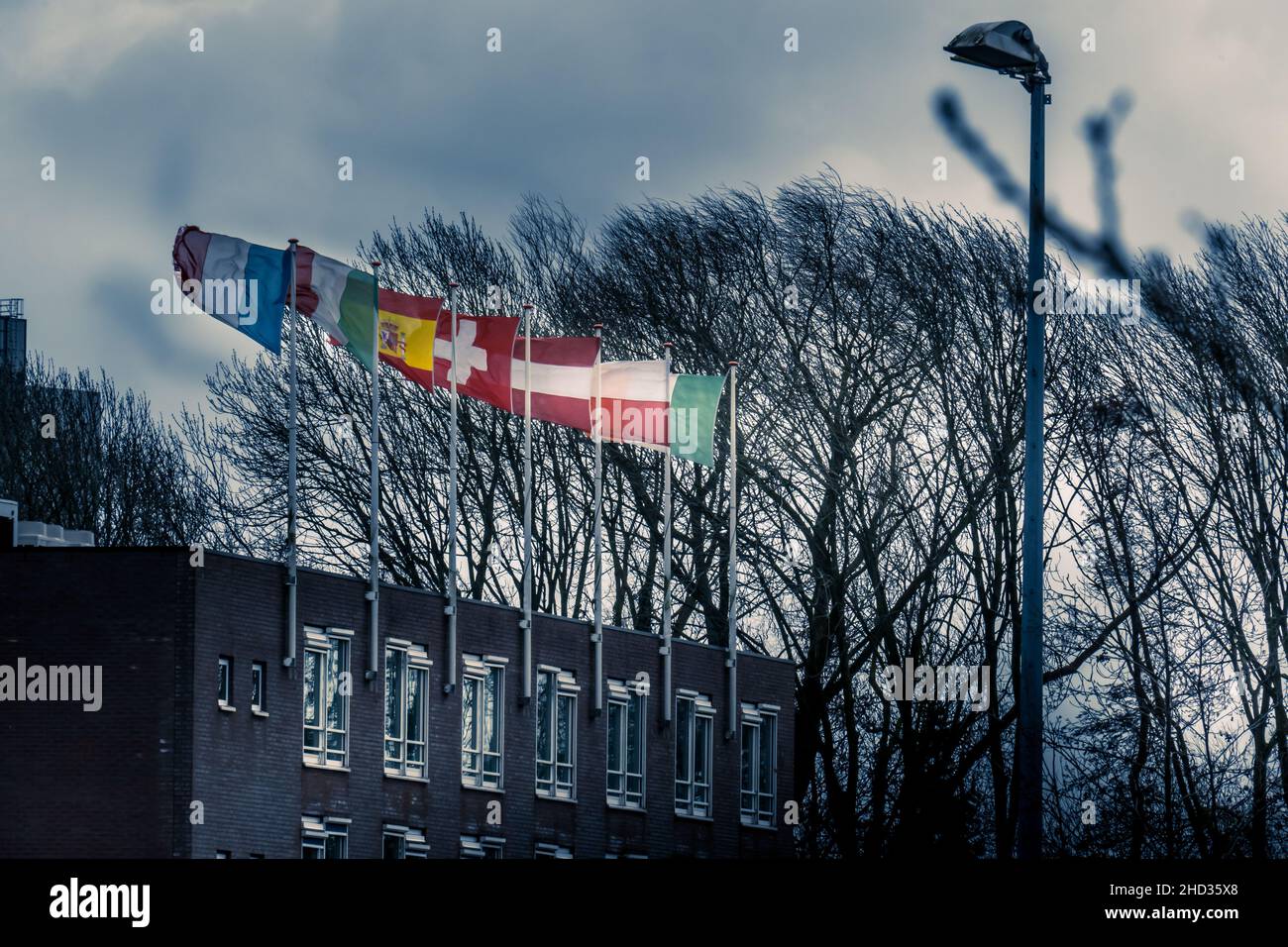 Flags in wind on building hi-res stock photography and images - Alamy