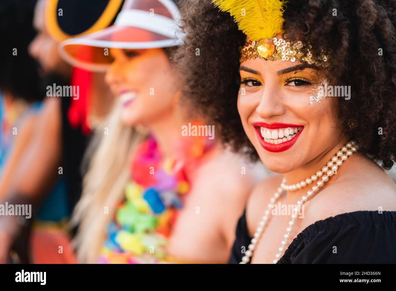 Carnaval in Brasil, portrait of pretty woman smiling at brazilian party ...