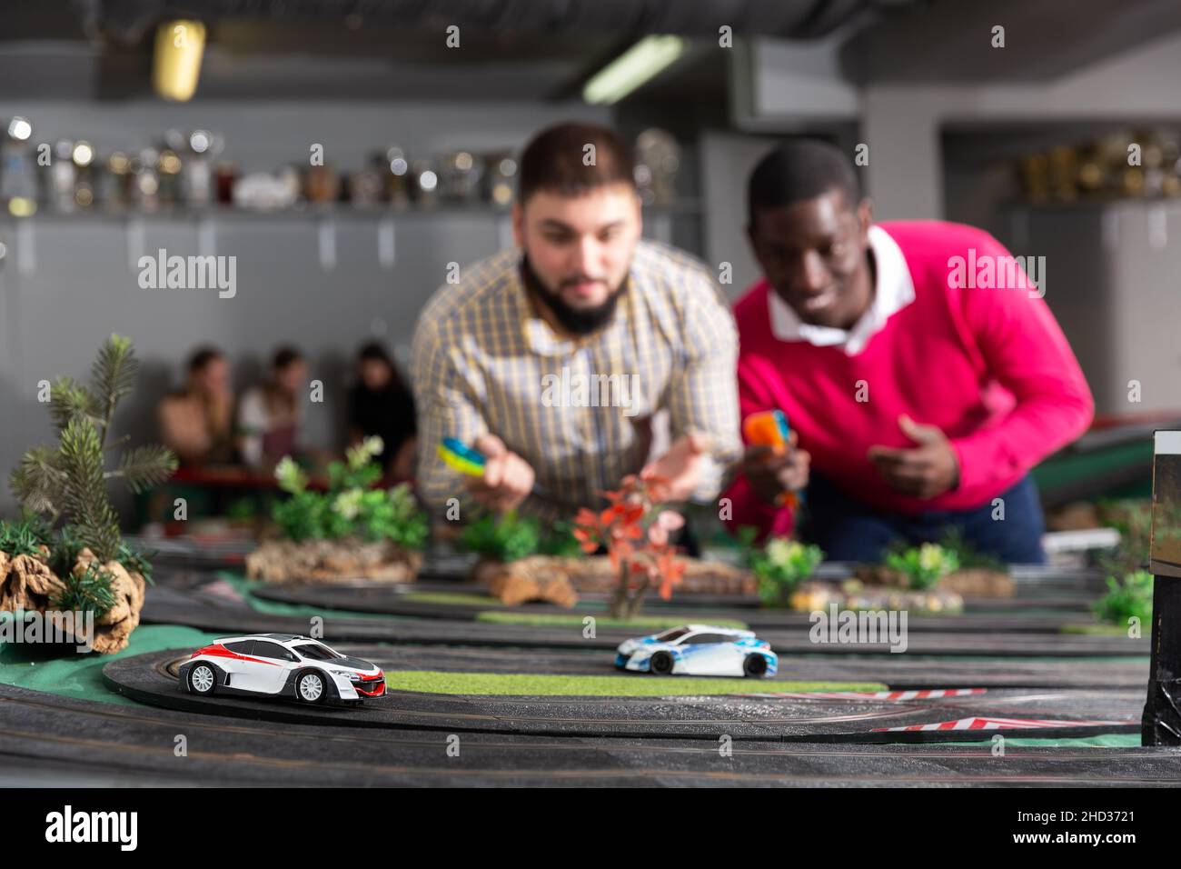 Models of race cars on track Stock Photo - Alamy