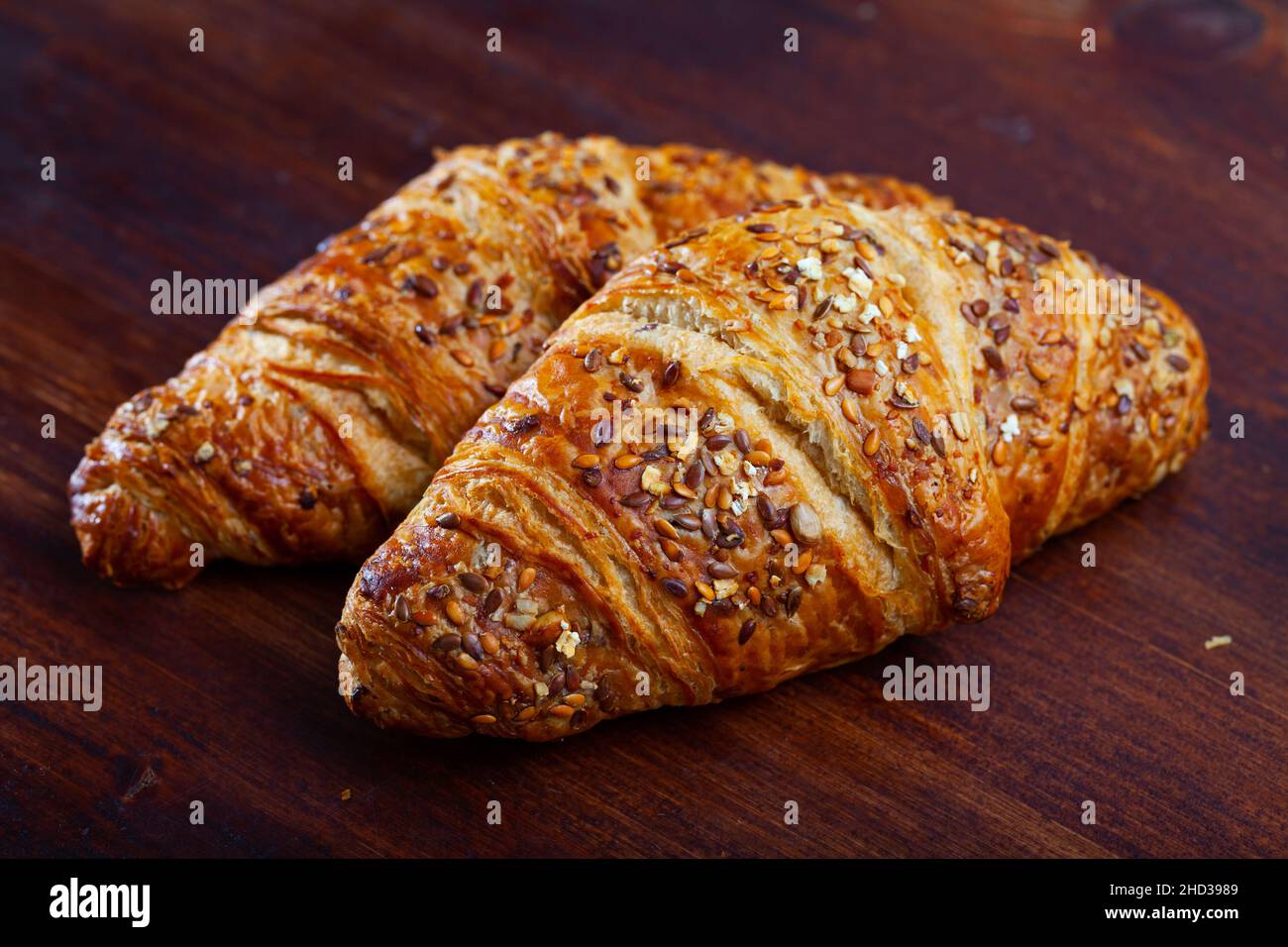 Fresh tasty multigrain croissants on table in kitchen Stock Photo - Alamy