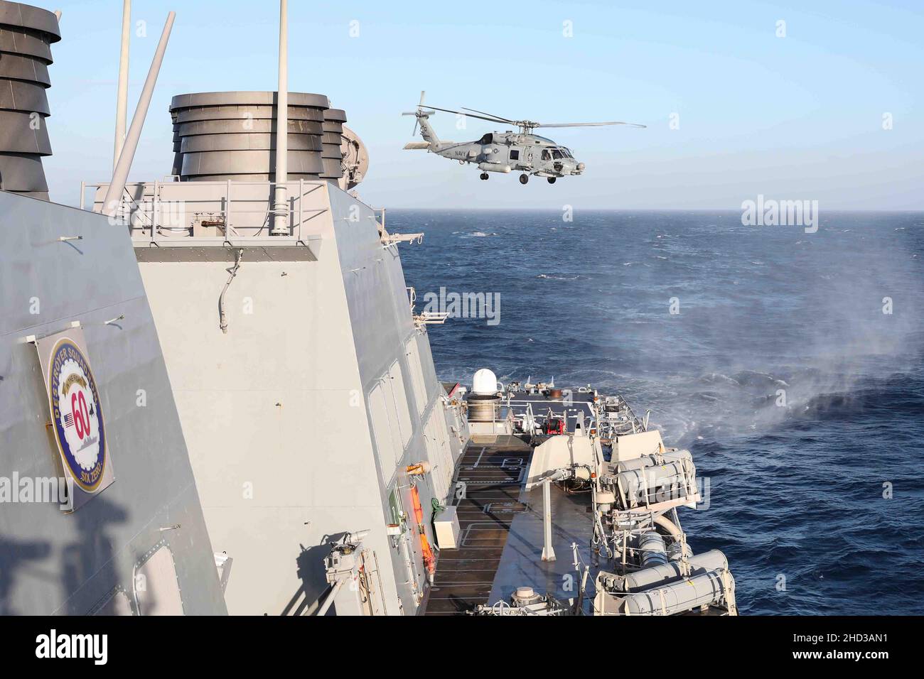 An MH-60R Seahawk helicopter, attached to the Helicopter Maritime ...
