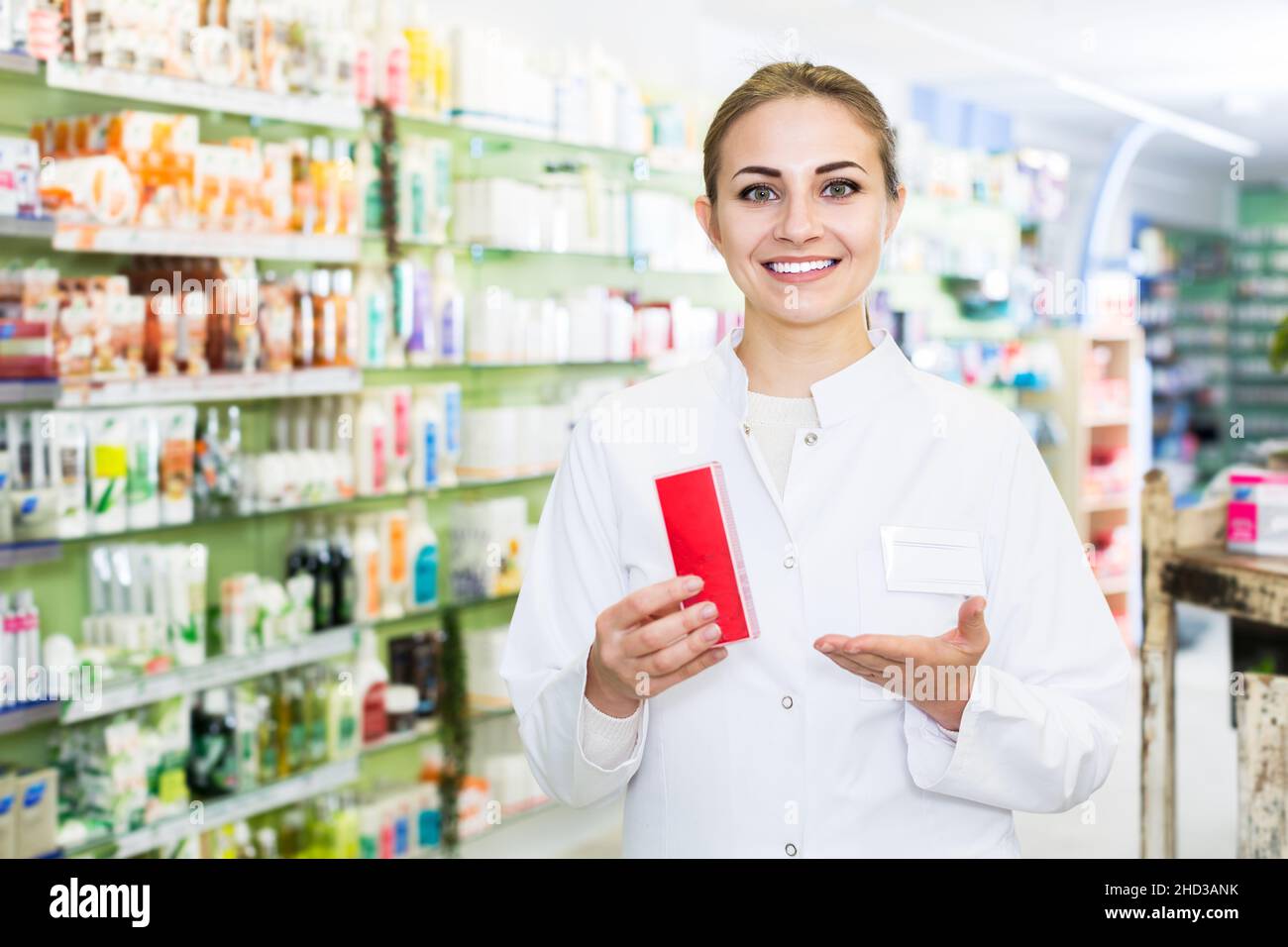 Female pharmacist posing with medicines Stock Photo - Alamy