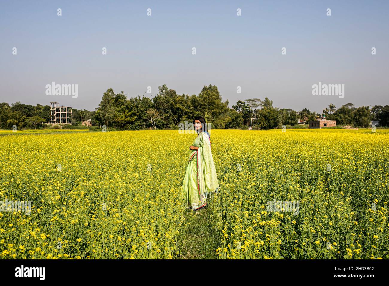 Dhaka, Bangladesh. 31st Dec, 2021. A woman poses for a photo at a ...