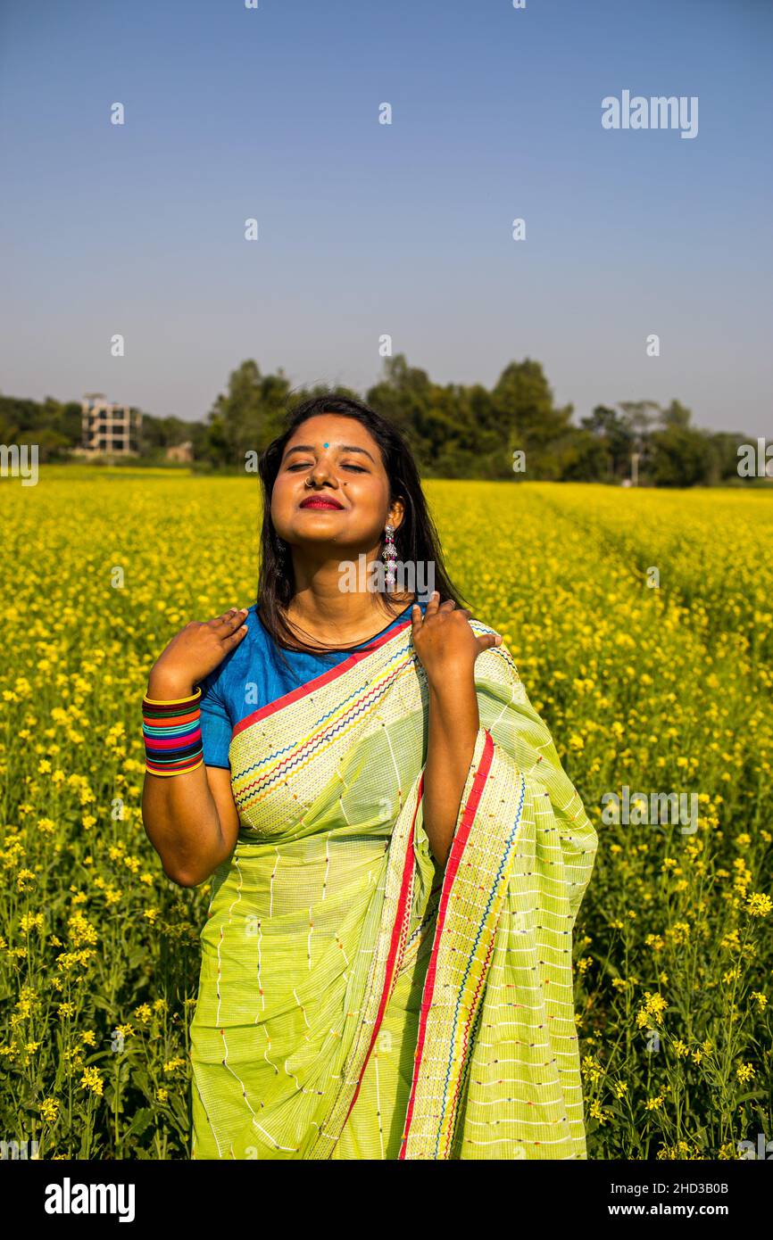Dhaka, Bangladesh. 31st Dec, 2021. A woman poses for a photo at a ...