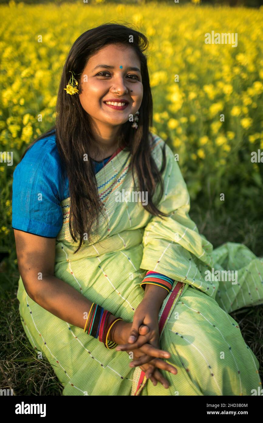 Dhaka, Bangladesh. 31st Dec, 2021. A woman poses for a photo at a ...