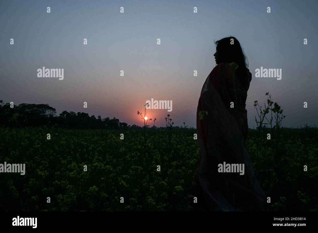 Dhaka, Bangladesh. 31st Dec, 2021. A woman poses for a photo at a ...