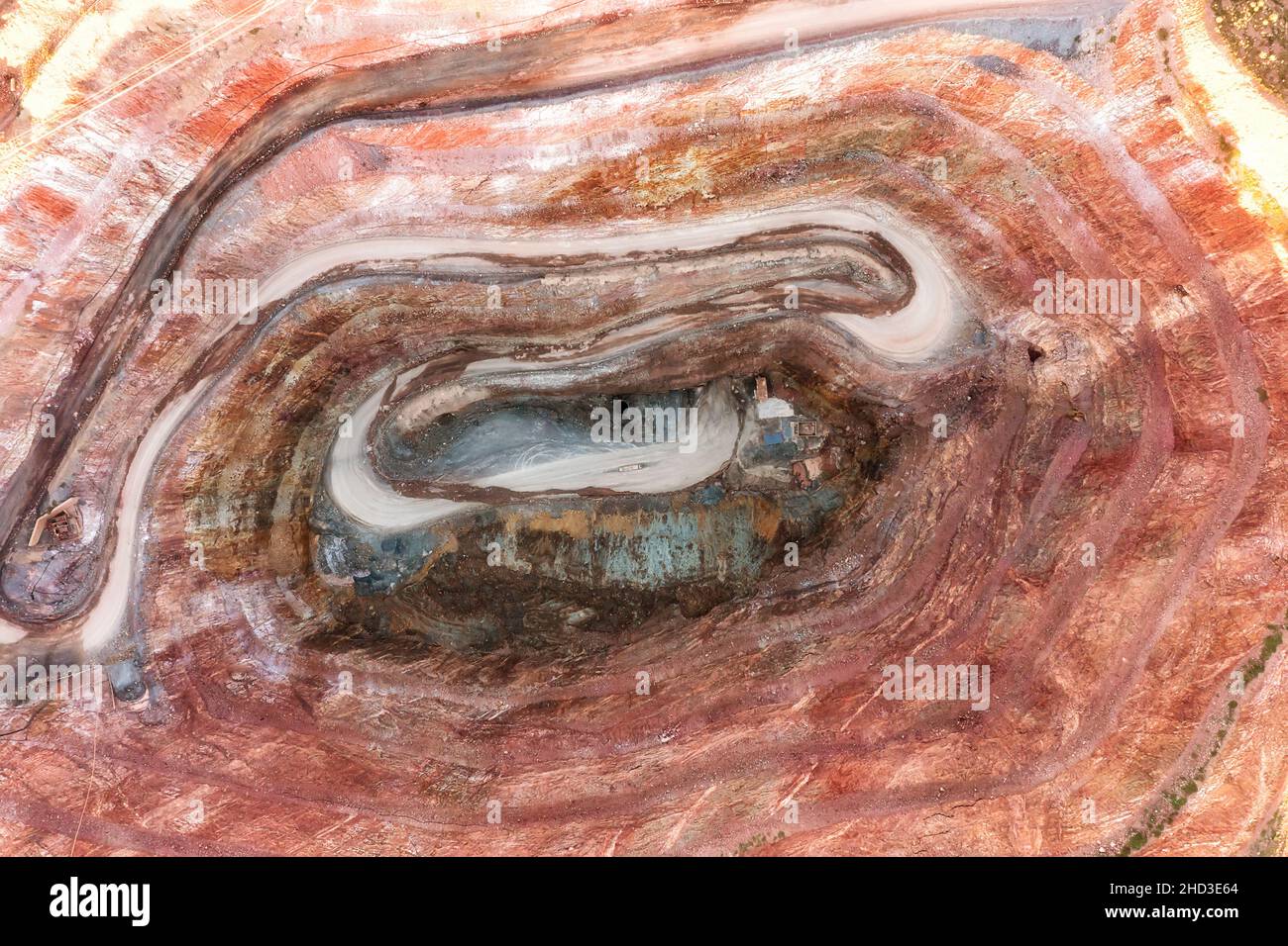 Bottom of open pit copper mine in Cobar town of Australa - aerial top ...