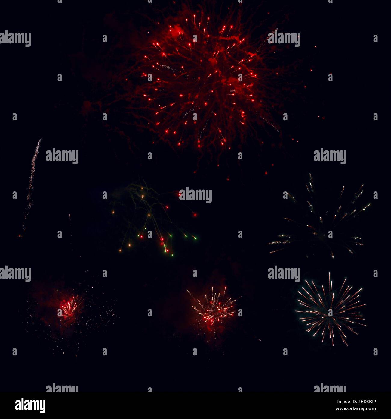 set of red fireworks and phases of explosion of firewoks on dark ...