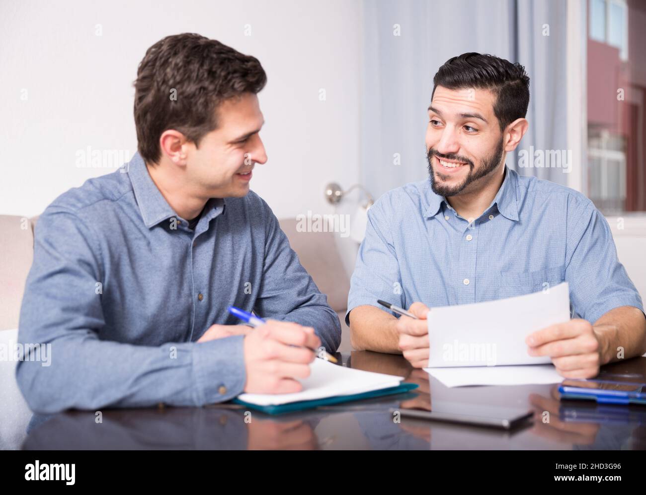 Cheerful group two men hi-res stock photography and images - Alamy