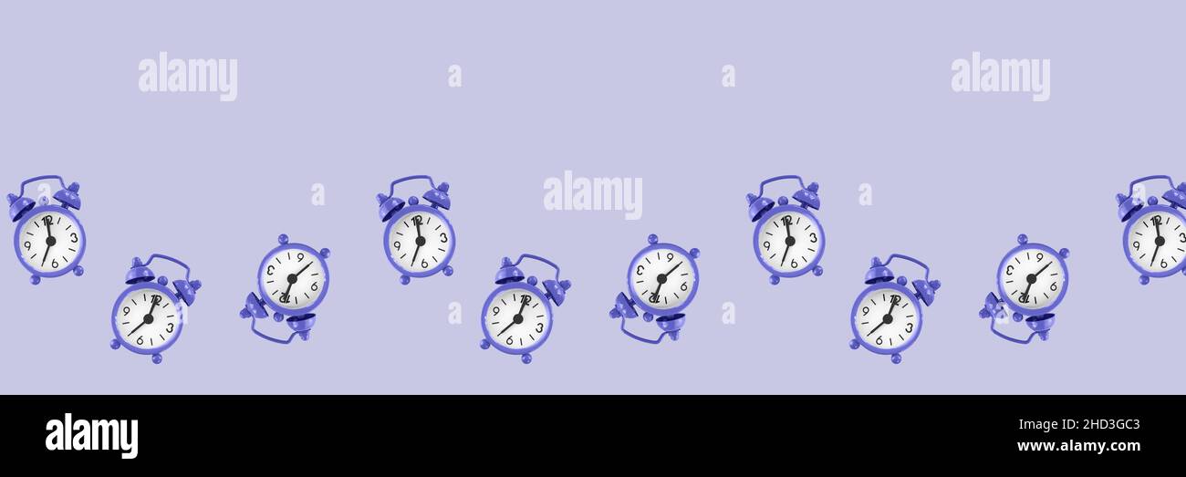 Purple alarm clocks pattern on purple background banner size, very peri ...