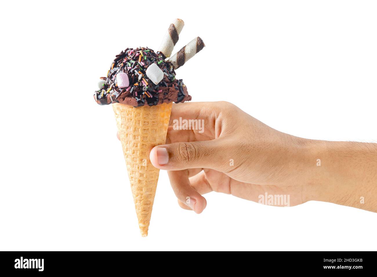 Human hand holding chocolate ice cream isolated over white background ...