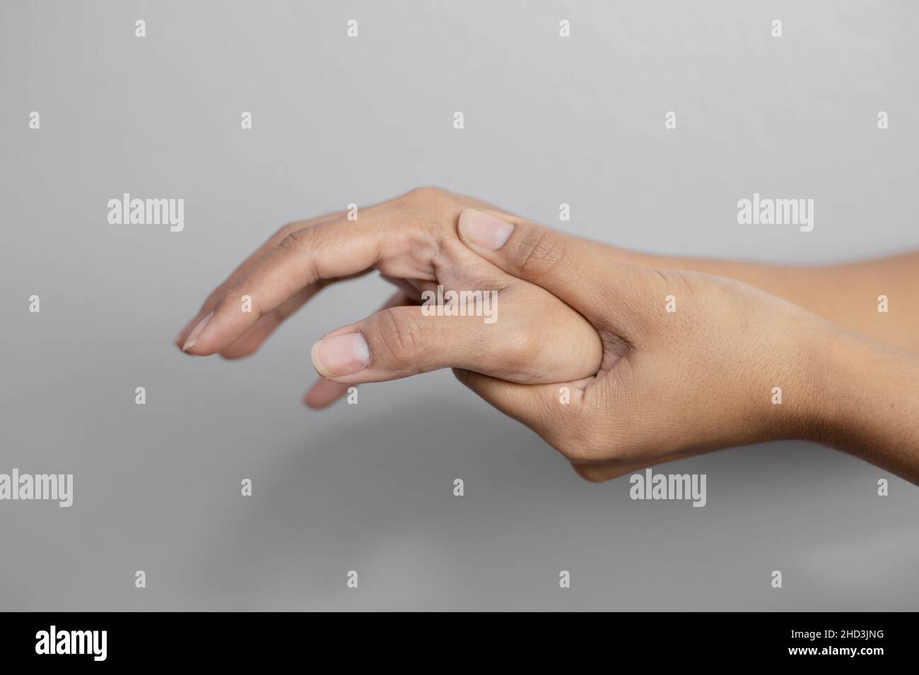 Woman suffering from pain in hand. Pain in the hand. Young woman hold ...