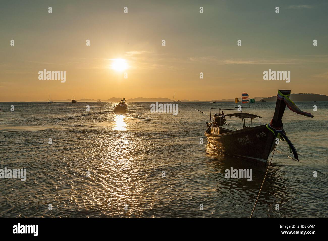Railay Beach West at sunset. This is one of the most famous beaches in ...