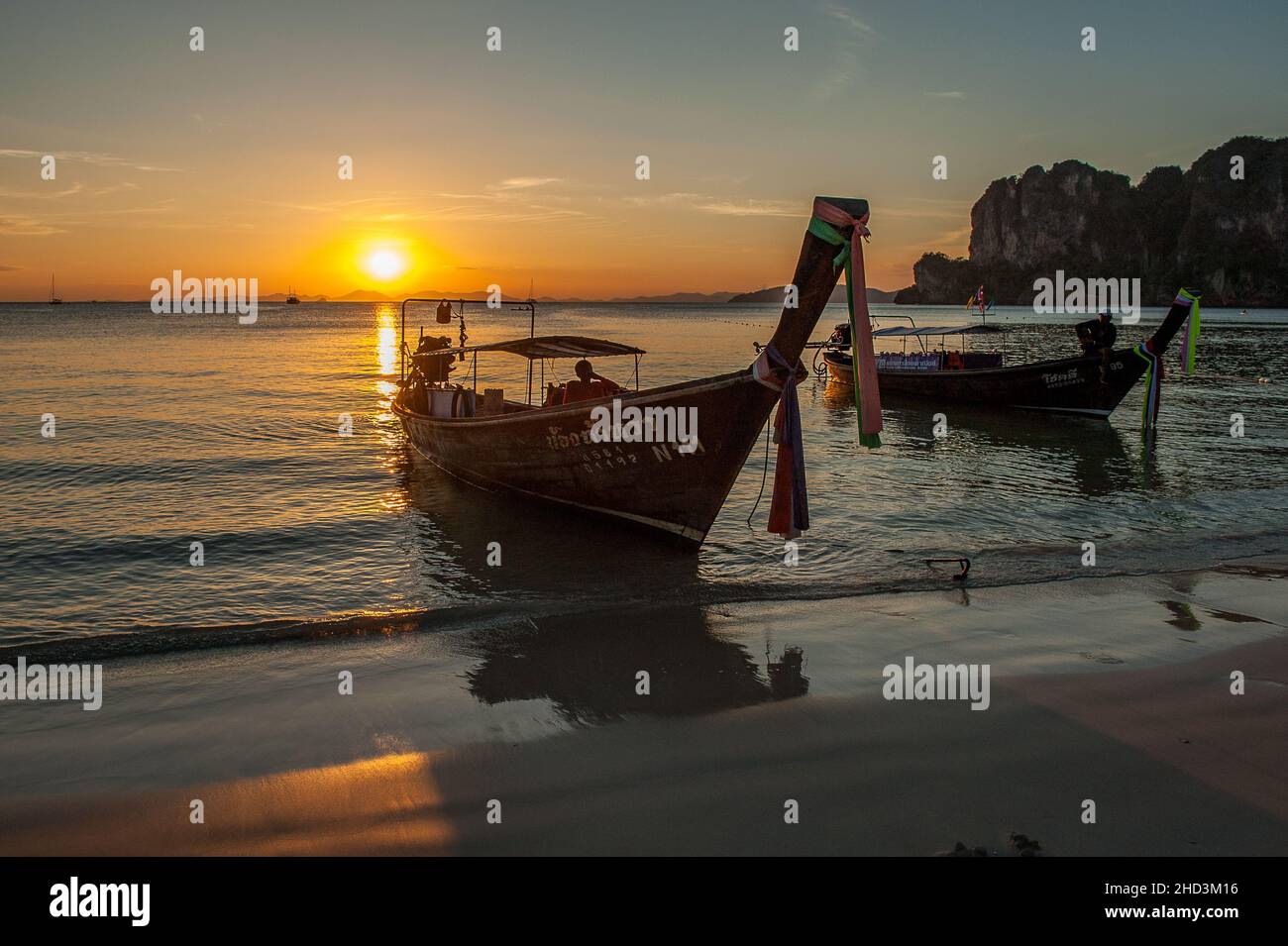 Railay Beach West at sunset. This is one of the most famous beaches in ...
