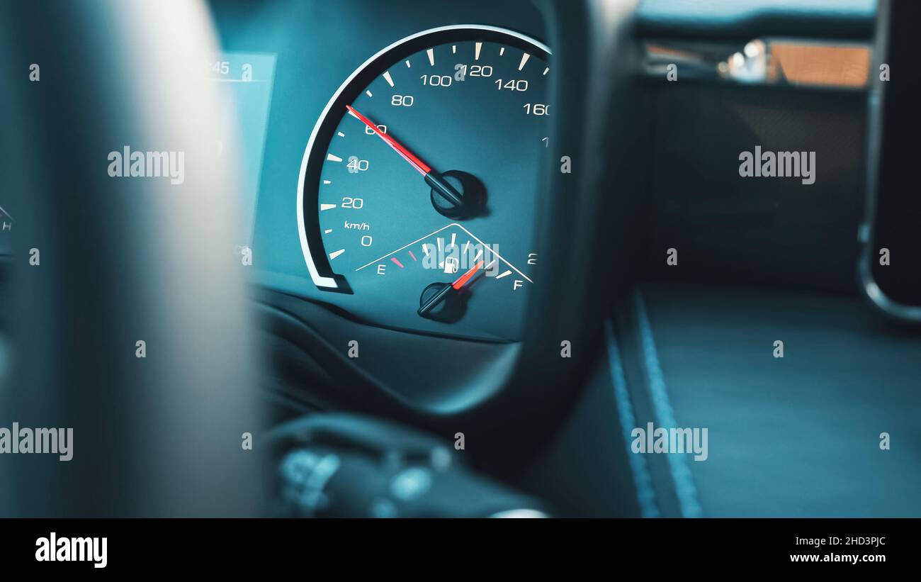 Red arrow on dashboard speedometer shows speed increase Stock Photo - Alamy
