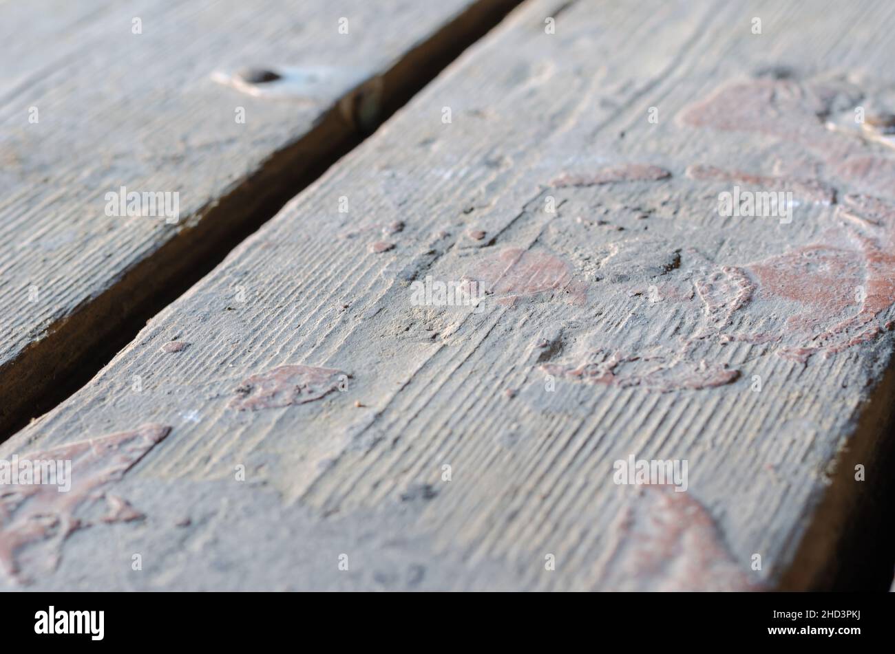 x†Old numbered boards on the floor. Dirty rectangular repeating boards ...