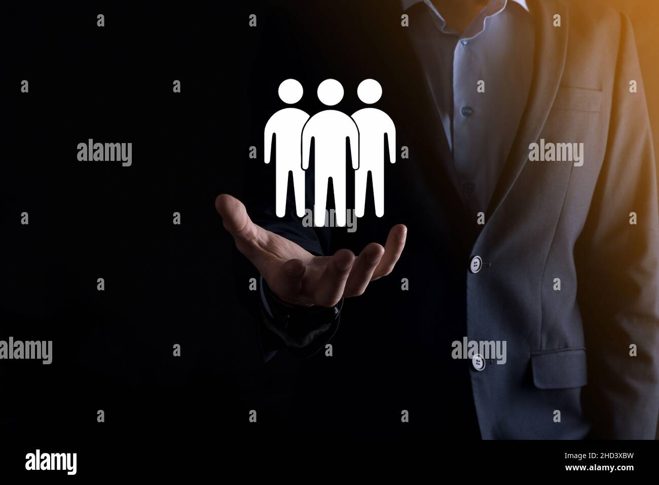 Businessman hold teamwork icon. Building a strong team. people icon ...