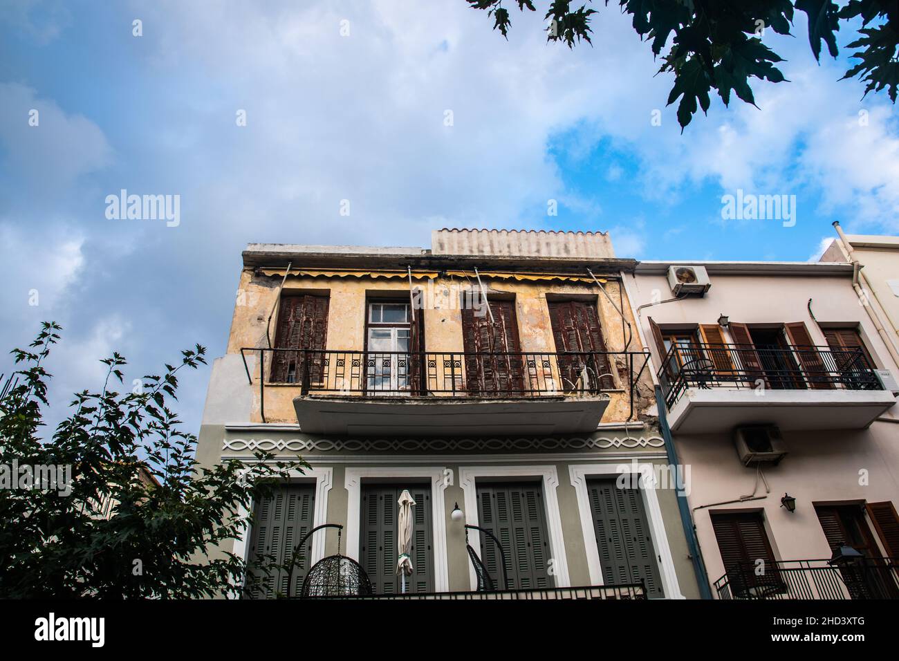 Buildings with balconies in Chania Crete Stock Photo - Alamy