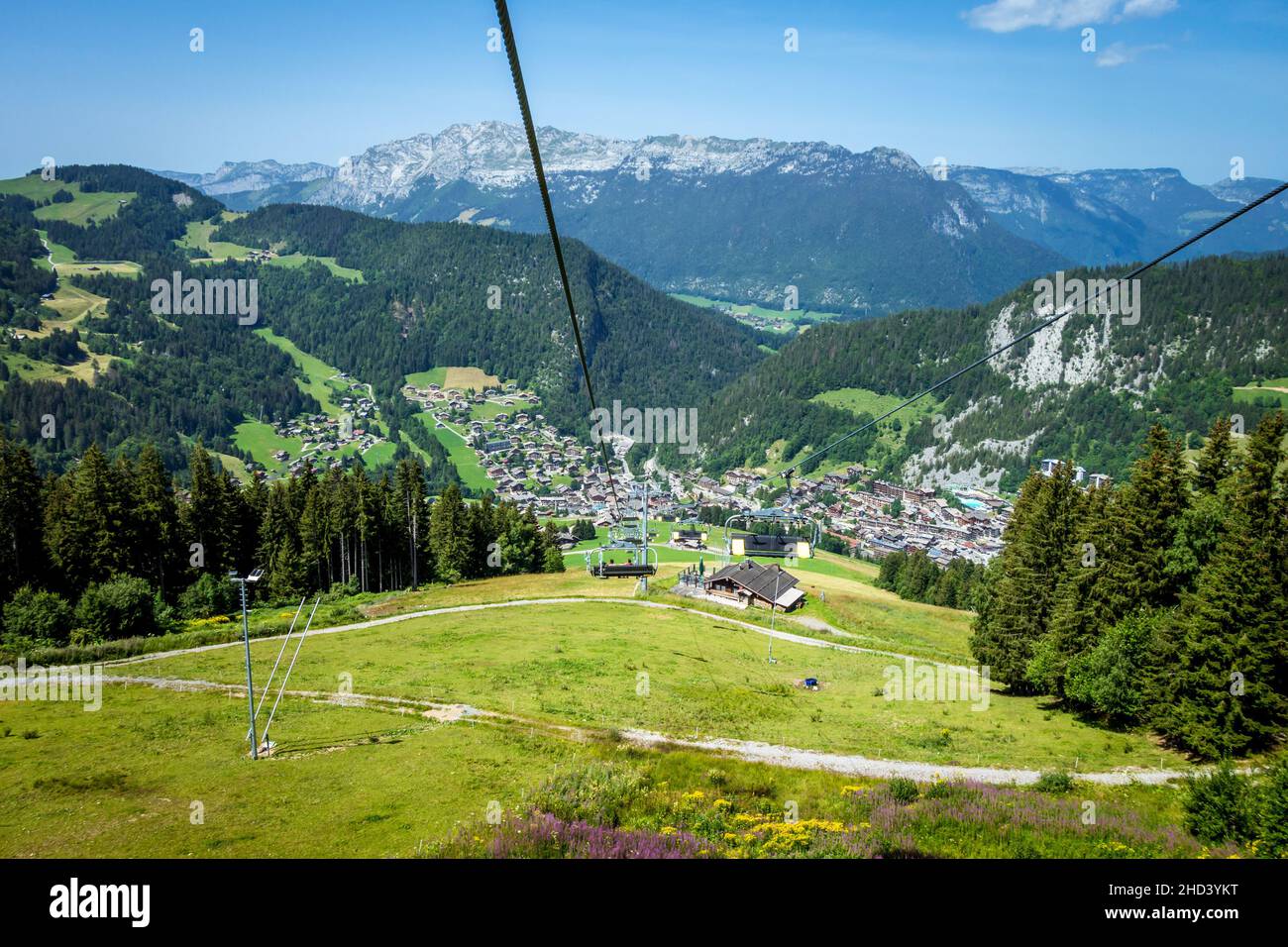 Chair lift above the village of La Clusaz in summer, France Stock Photo ...