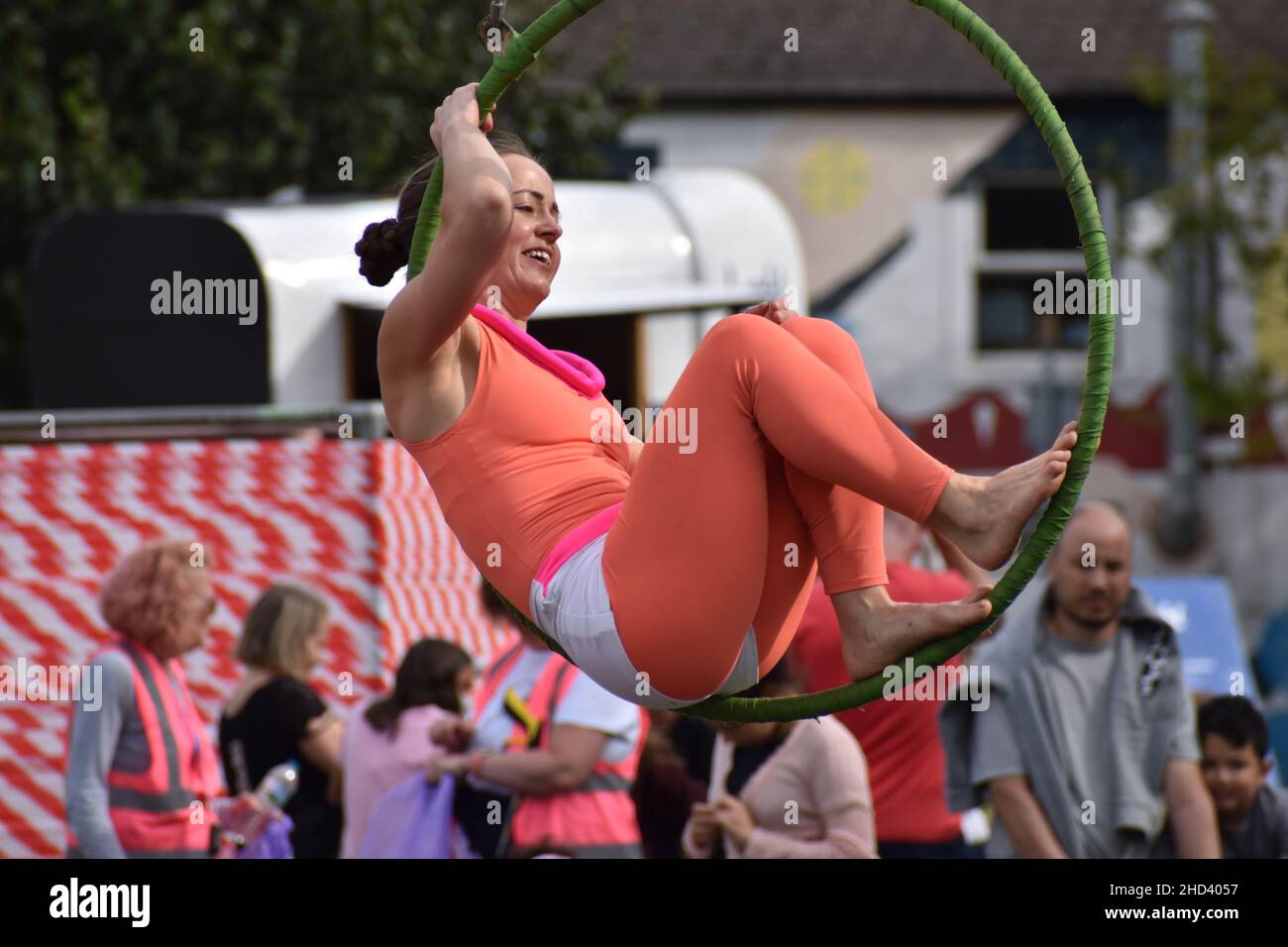 Flexible girl in a hoop Stock Photo - Alamy