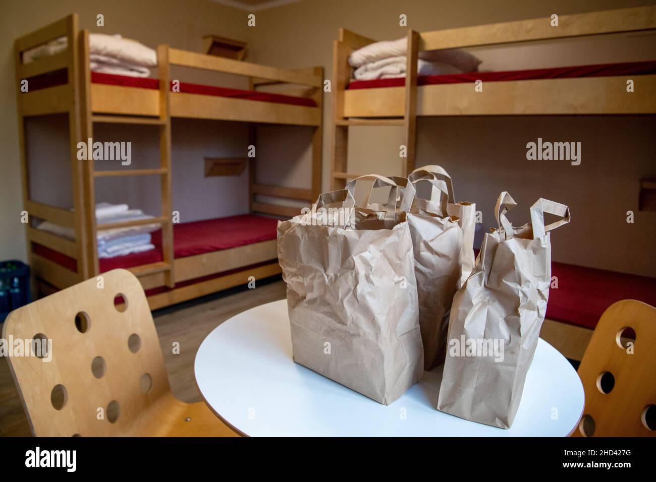 Emden, Germany. 03rd Jan, 2022. Bags of food stand in the rooms of ...