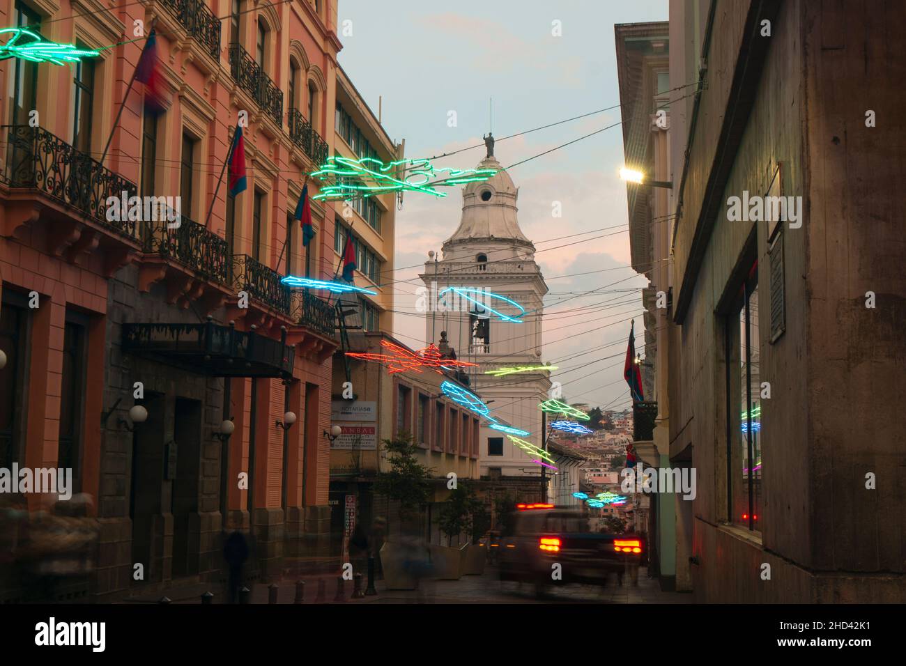 Quito, Pichincha, Ecuador - January 1 2022: Tourists walking at sunset ...
