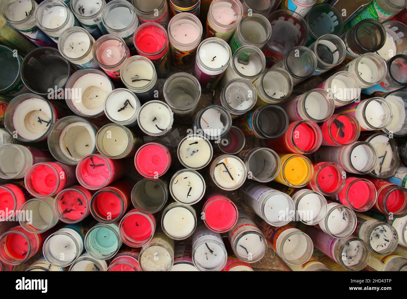 Many jars of lit candles as wishfully thinking for hopes and dreams to ...