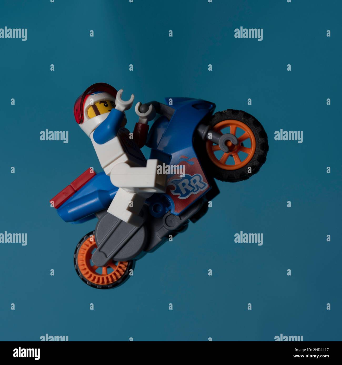 lego motorcyclist doing a can-can trick jump Stock Photo - Alamy