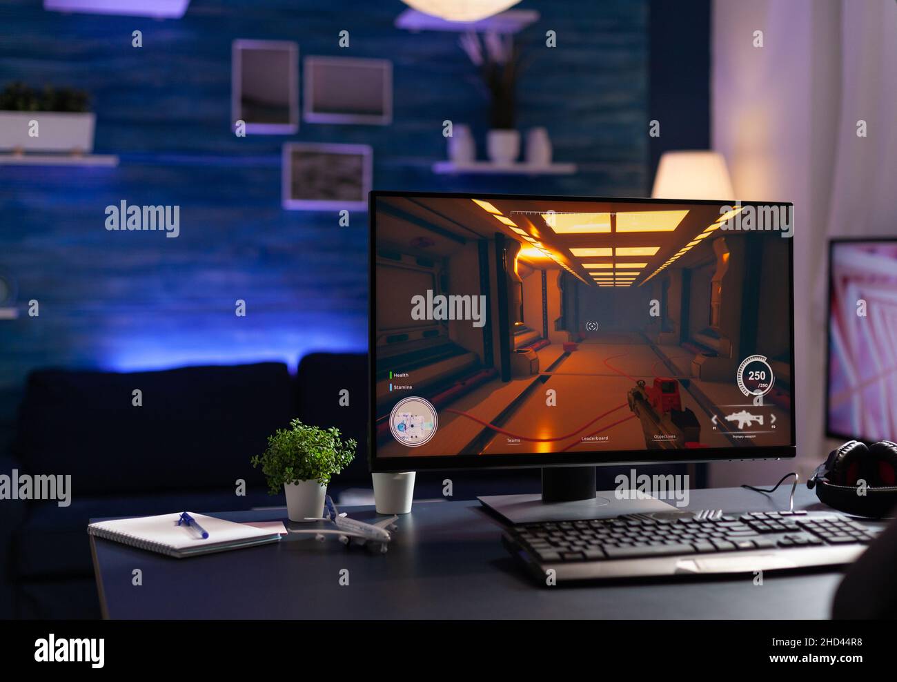 Nobody at desk with online video games on computer to play with ...