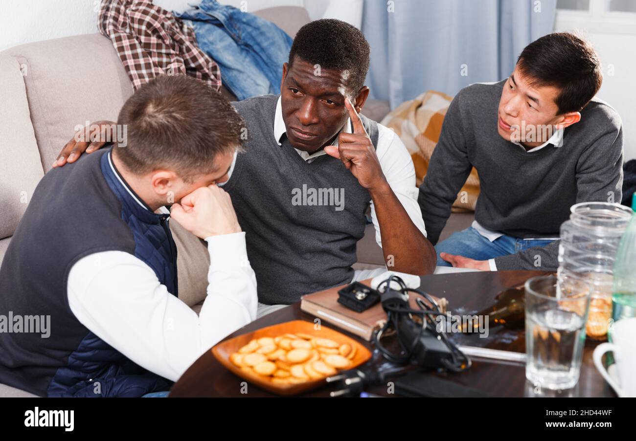 Two friends are talking about life and supporting sad man Stock Photo ...