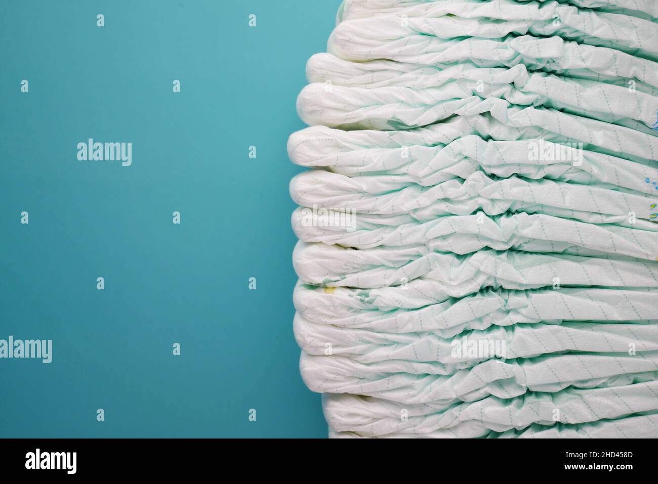 stack of baby diaper on table with copy space Stock Photo - Alamy