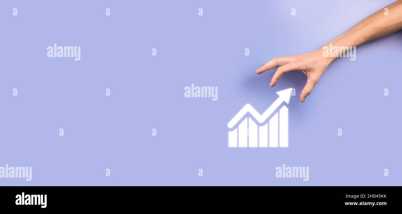 Male hand holding graph icon symbol.checking analyzing sales data ...