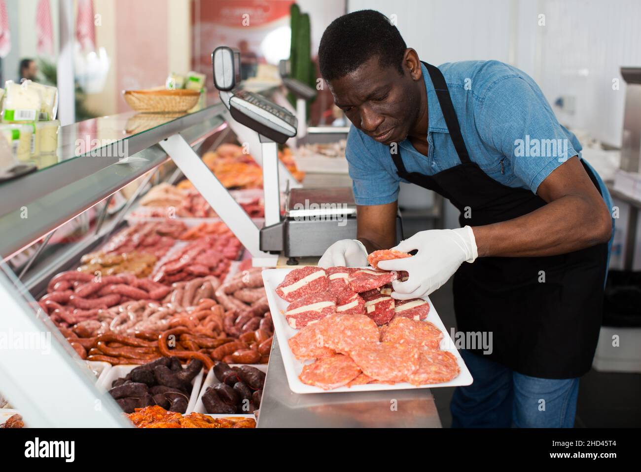 Preparing beef for sale hi-res stock photography and images - Alamy