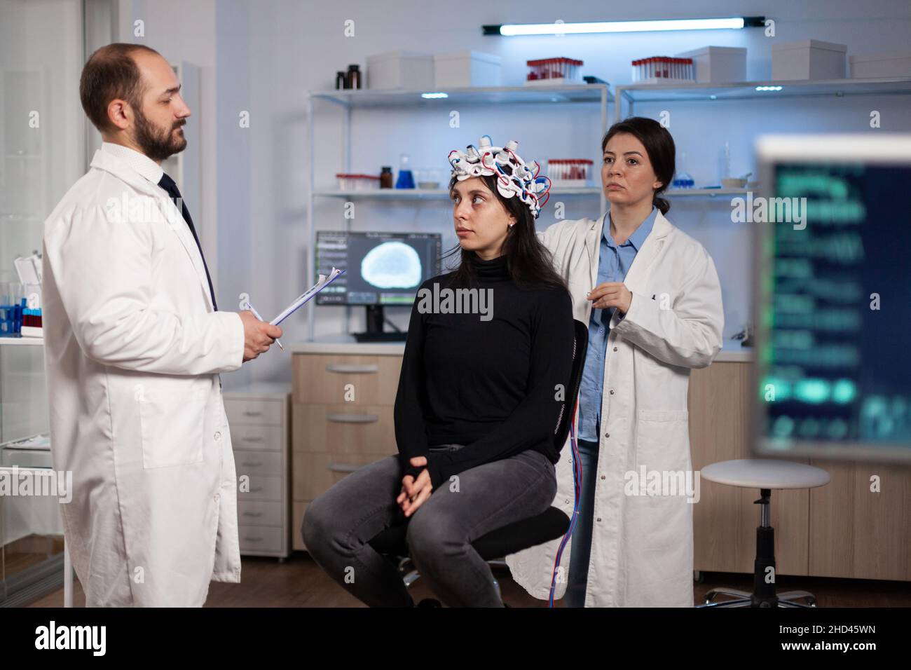 Scientist doctor discussing neurology disease symptoms with woman ...