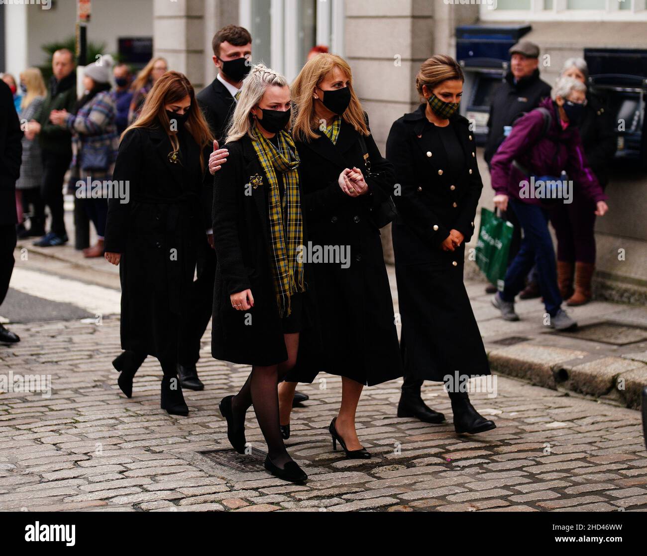 The funeral cortege leads the mourners as they arrive for the funeral ...