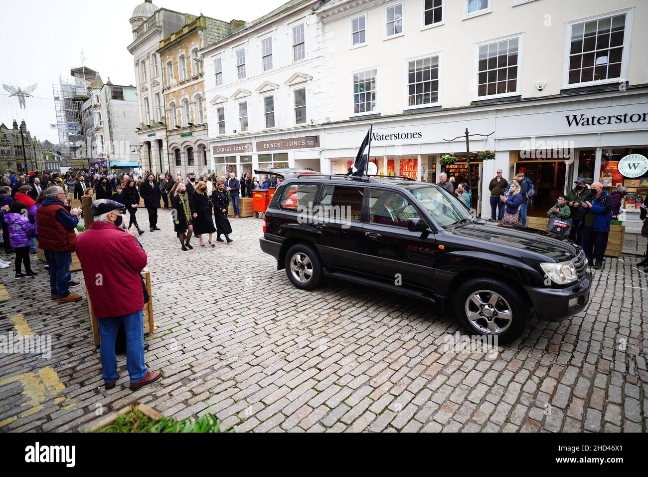 The funeral cortege leads the mourners as they arrive for the funeral ...
